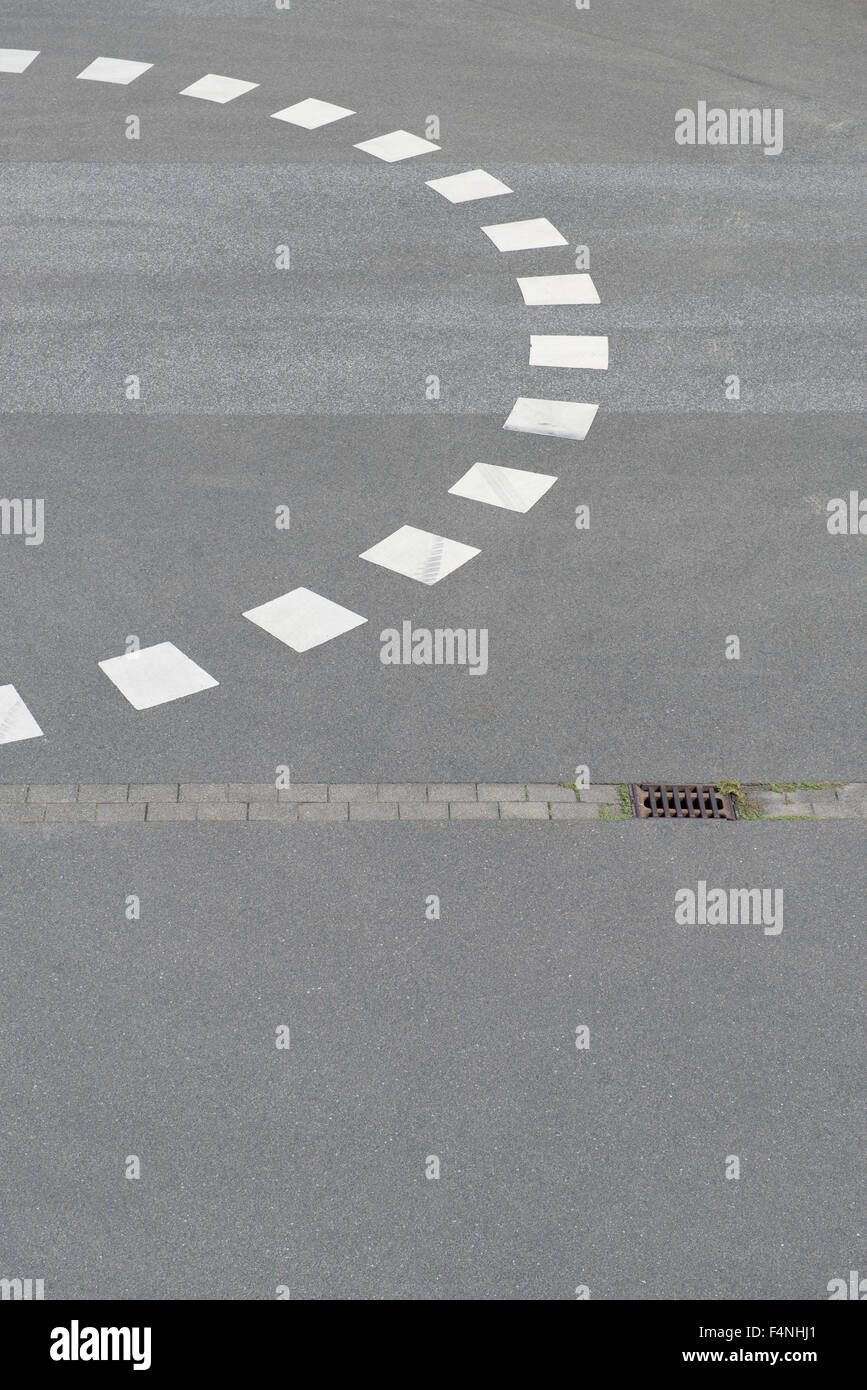 Marking of roundabout on tarmac Stock Photo - Alamy