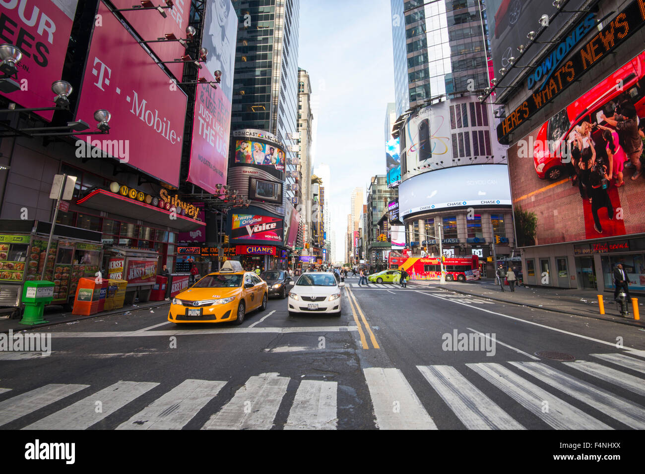 A view along 42nd St in Times Square, Midtown Manhattan New York USA ...