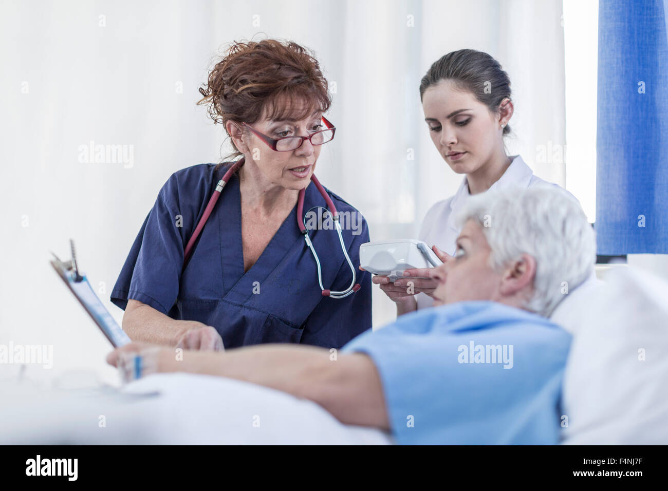 Doctor explaining patient advance directive Stock Photo - Alamy