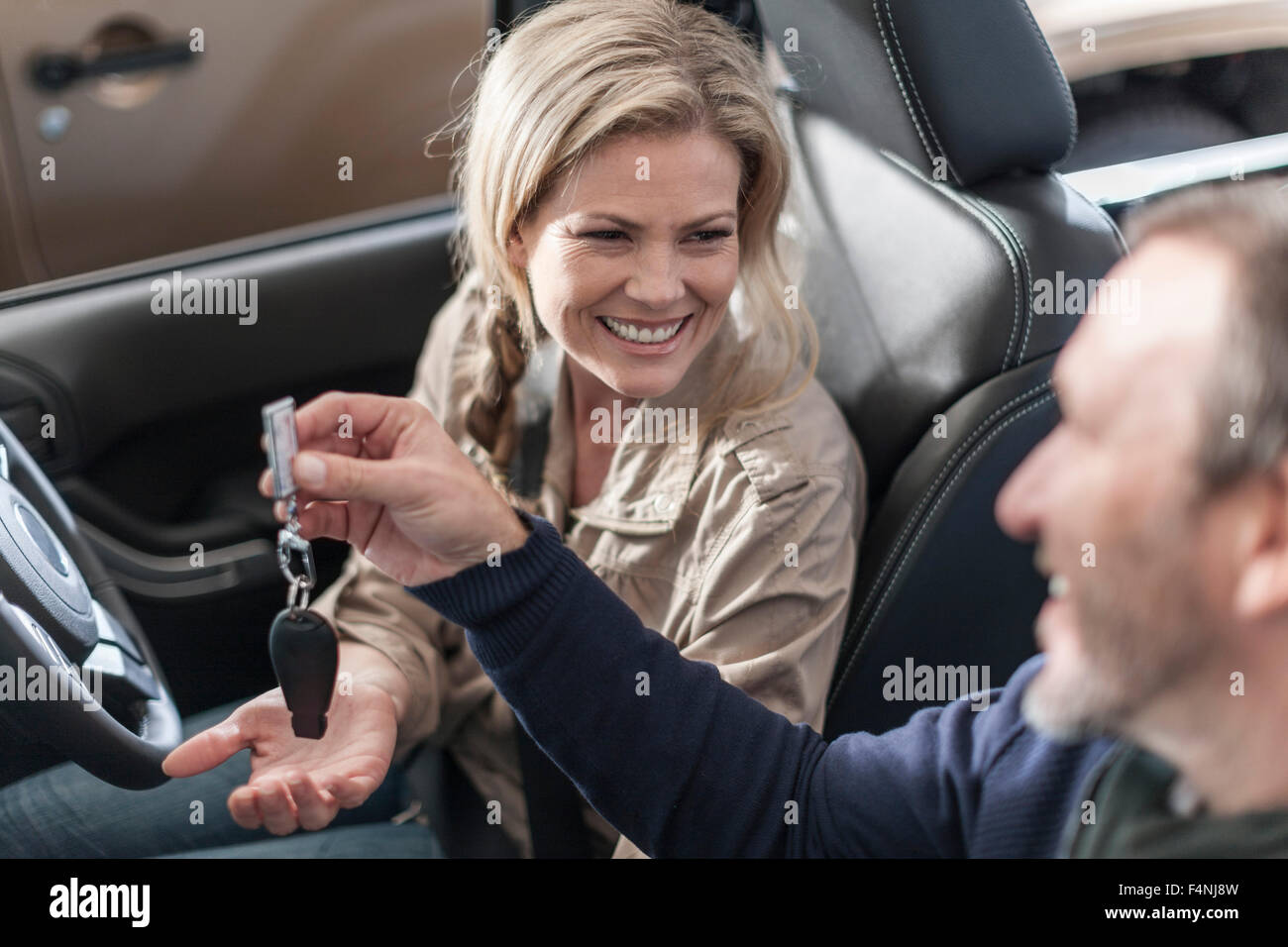 Handing over keys new car hi-res stock photography and images - Alamy