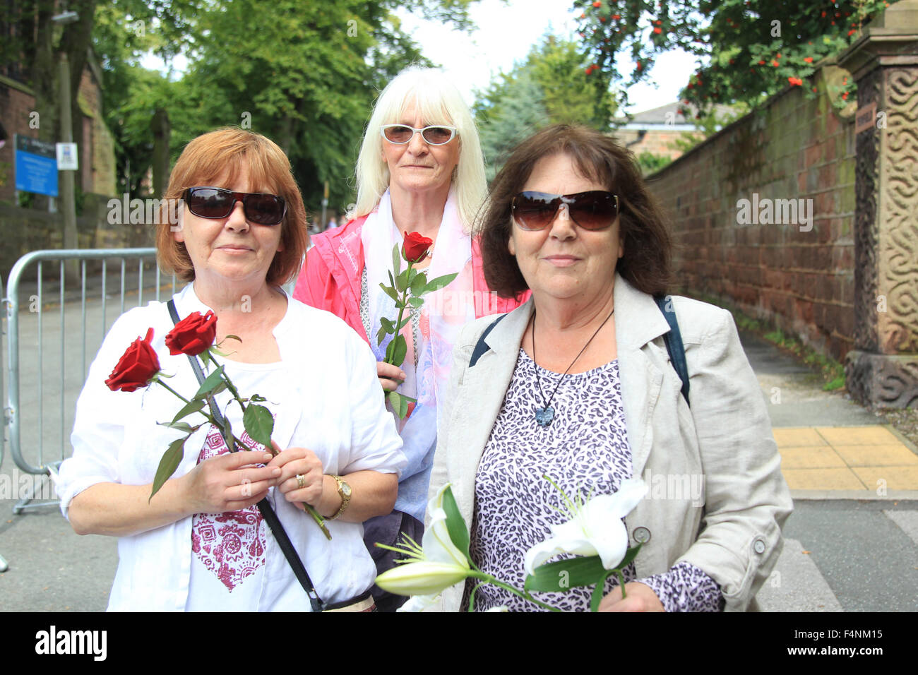 Mourners arrive for the funeral of Cilla Black. Helen Roberts, Patsy Roberts and Jenny Mathews ...