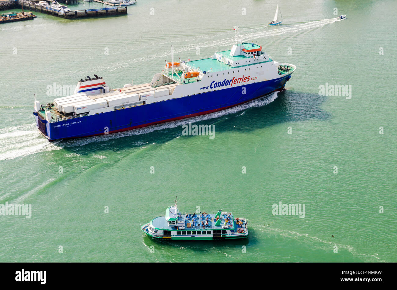 Condor Ferries freight ferry Commodore Goodwill and a passenger boat passing in Portsmouth ...
