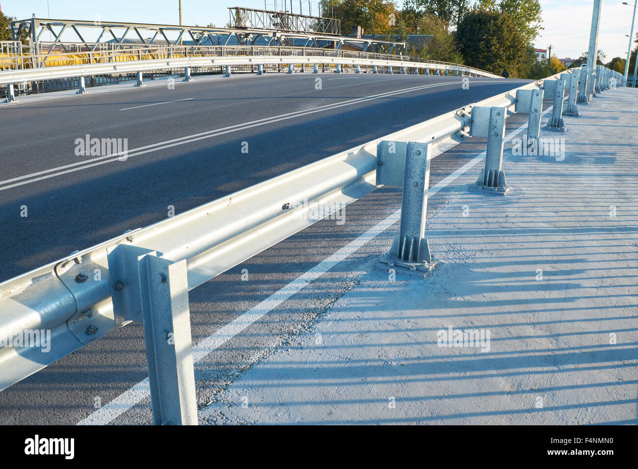 Anodized safety steel barrier on freeway bridge Stock Photo - Alamy