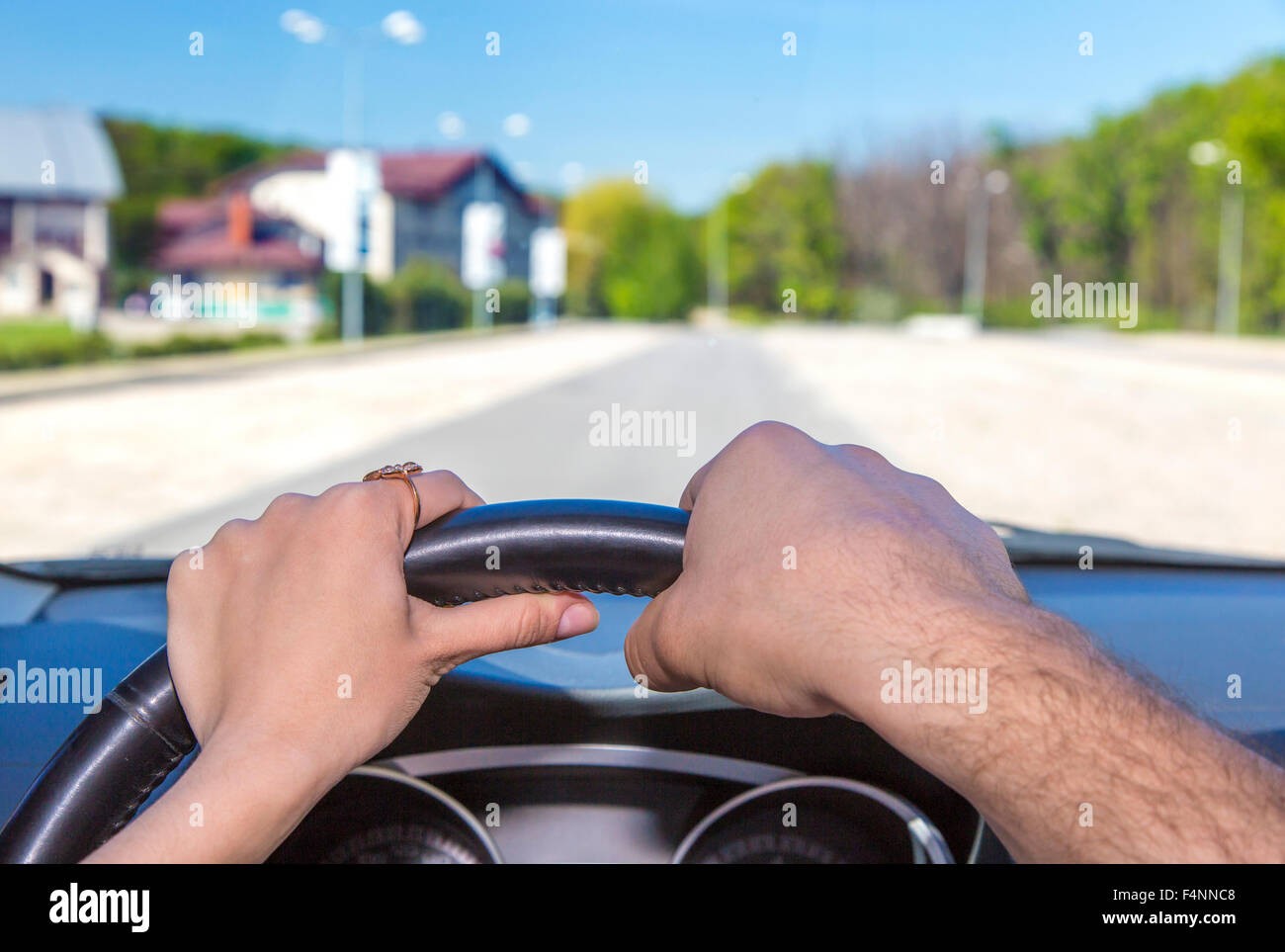 Driving car together Stock Photo - Alamy