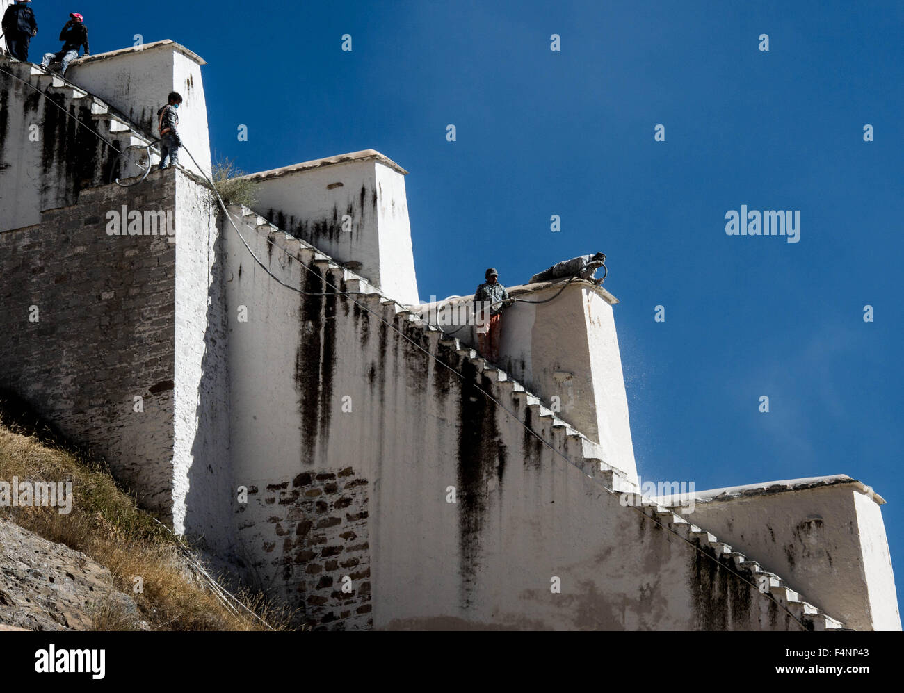 Lhasa, China's Tibet Autonomous Region. 21st Oct, 2015. Workers repaint ...