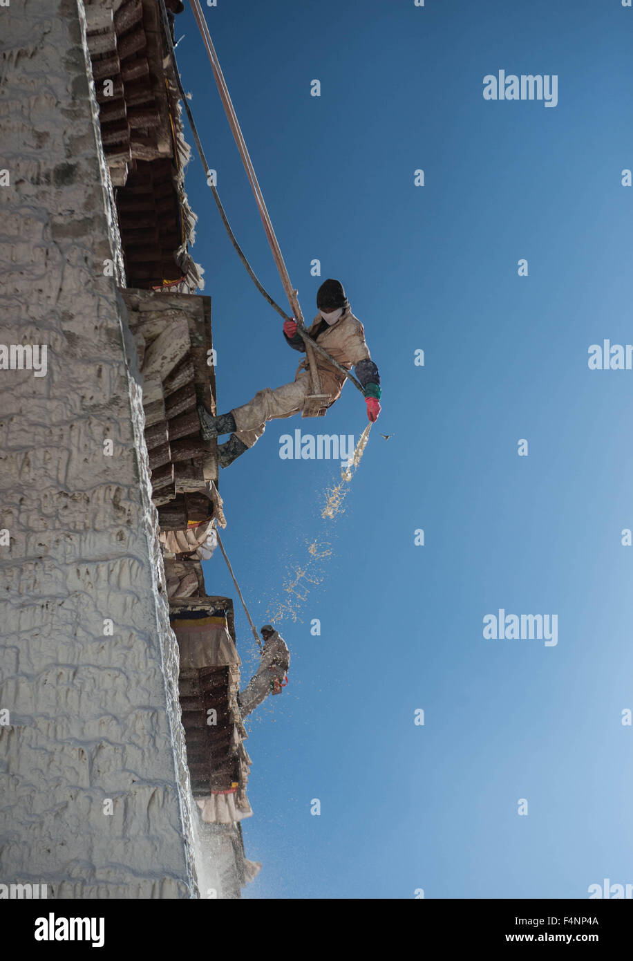 Lhasa, China's Tibet Autonomous Region. 21st Oct, 2015. Workers repaint ...