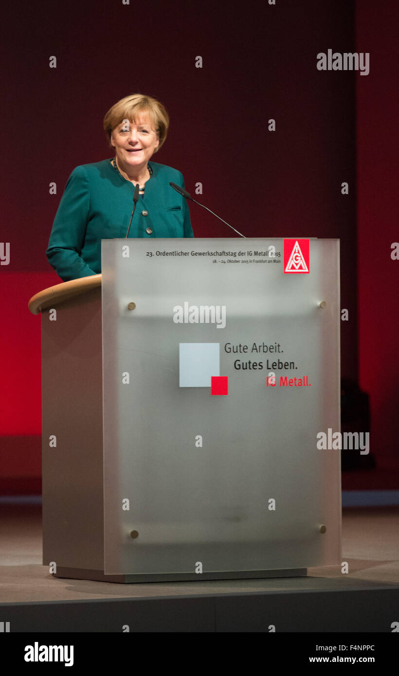 German Chancellor Angela Merkel gives a lecture at the podium under the ...
