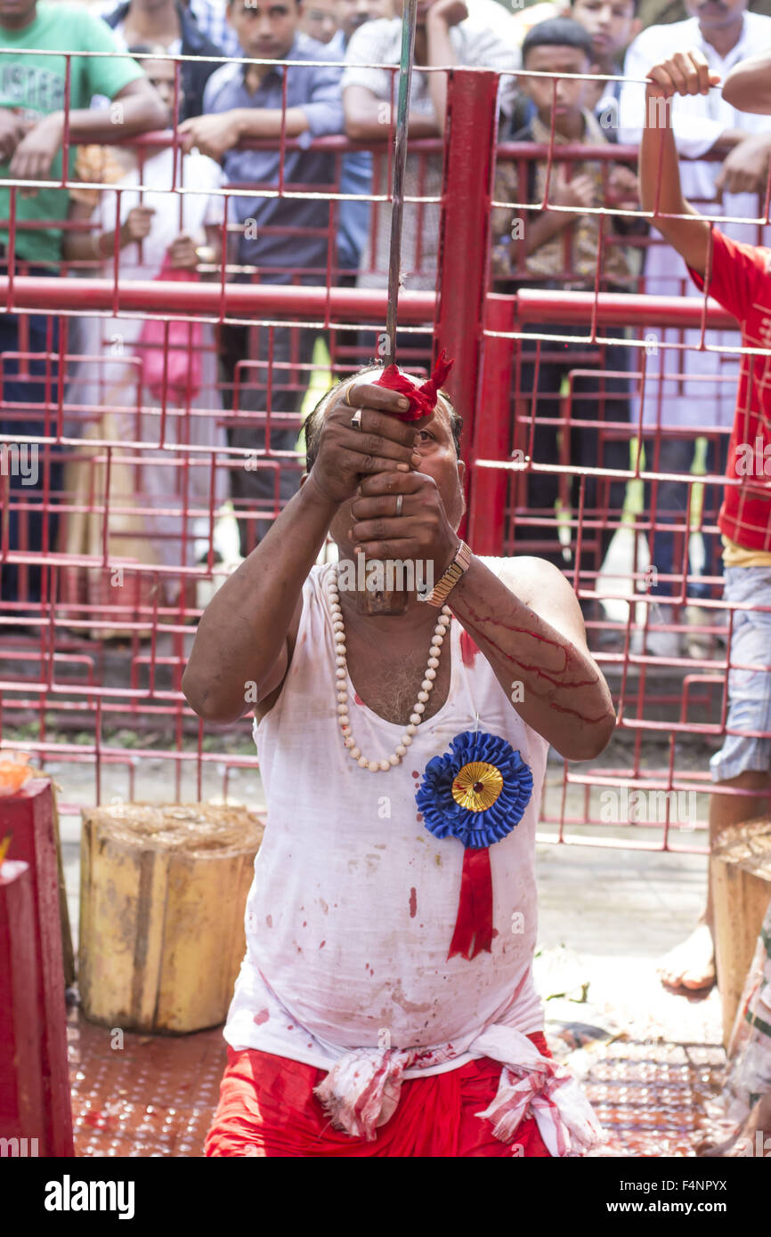 Sivasagar, Assam, India. 21st Oct, 2015. An Indian hindu priest prays ...