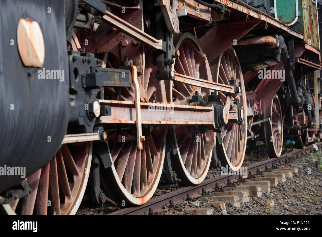 Old locomotive wheels close up Stock Photo - Alamy