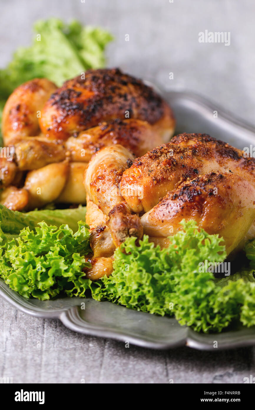 Whole Grilled mini chicken Stock Photo - Alamy