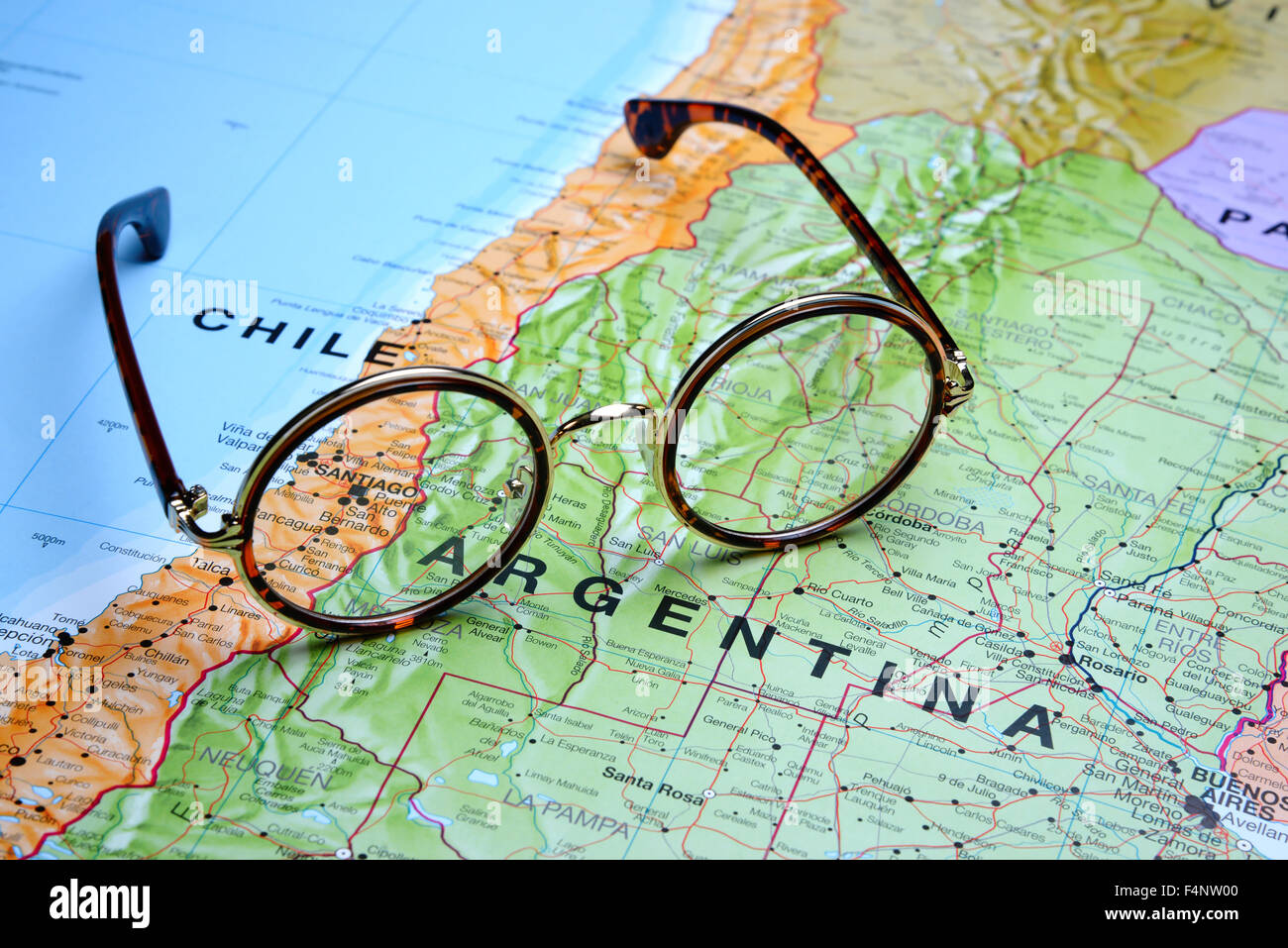 Glasses on a map - Santiago Stock Photo - Alamy