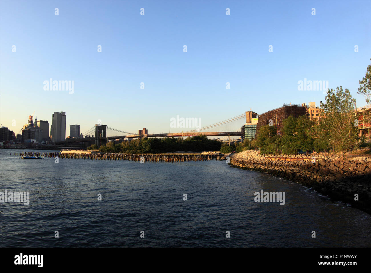 The Brooklyn Bridge looking north from the Brooklyn waterfront New York ...