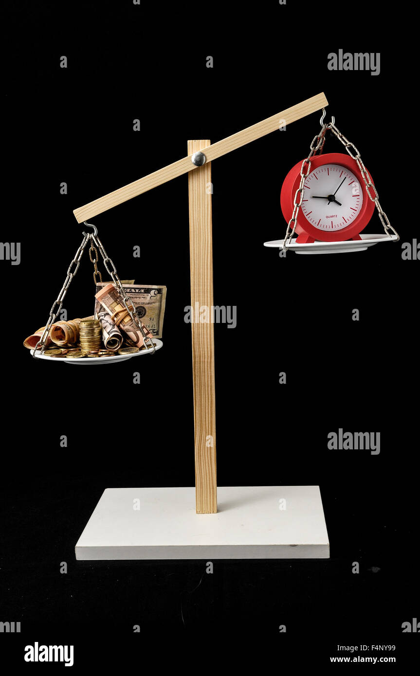 Clock and Currency Time is Money Concept Stock Photo - Alamy