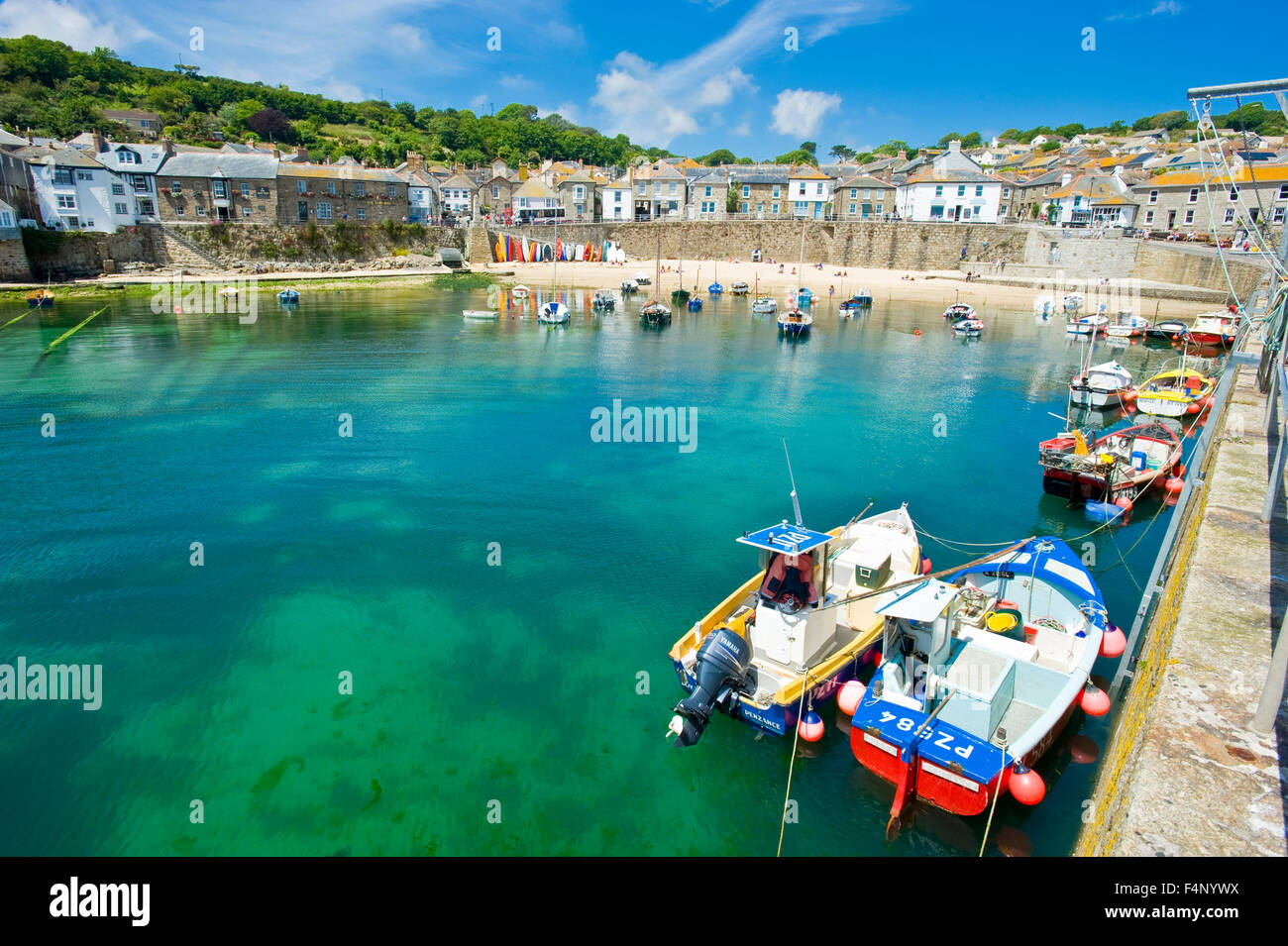 A view of the harbour in the quaint and picturesque fishing port and ...