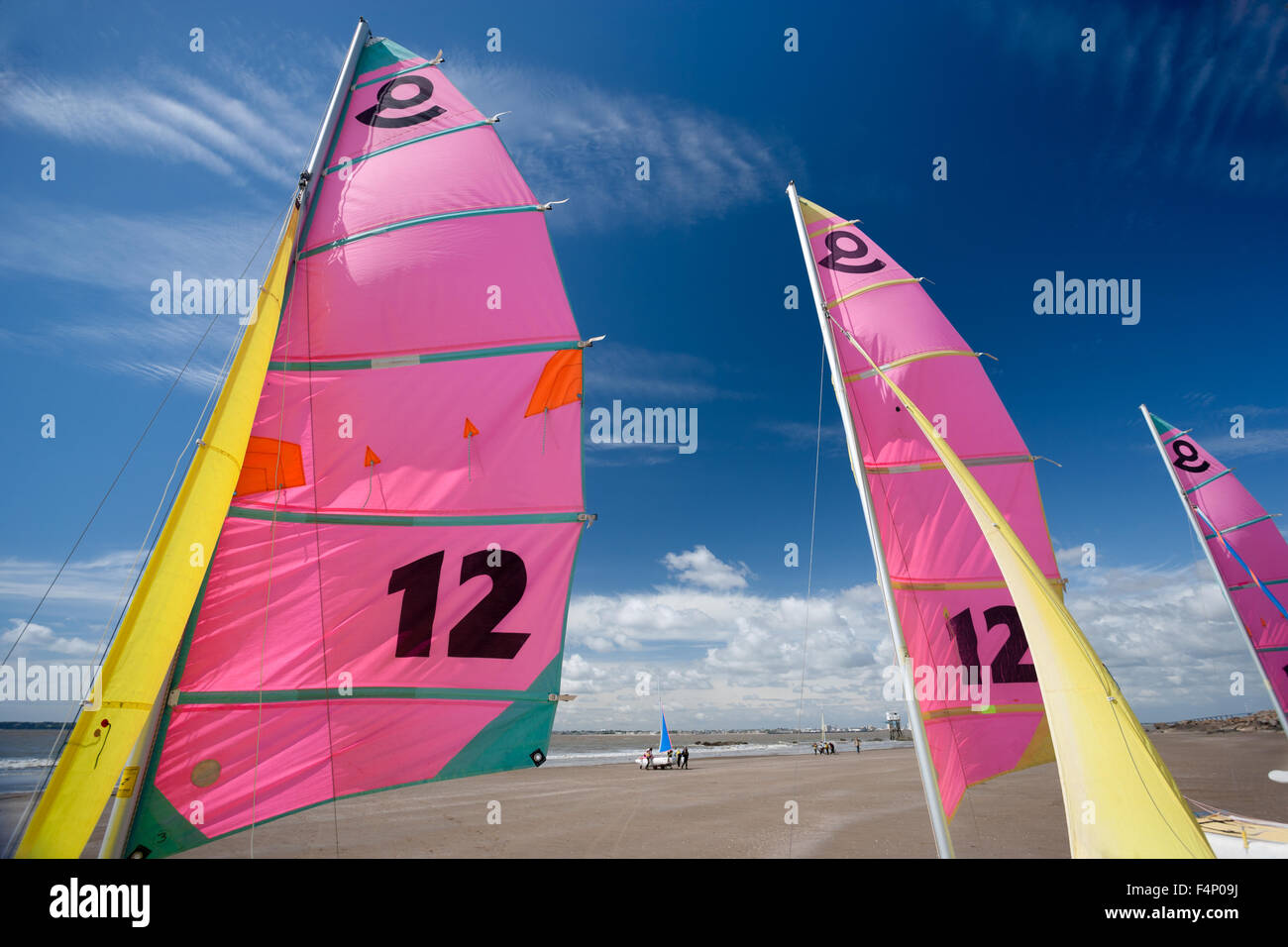 Catamaran sails on the beach Stock Photo - Alamy