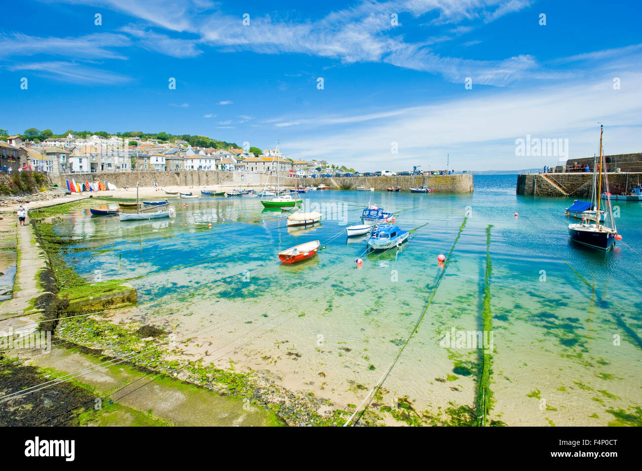 A view of the harbour in the quaint and picturesque fishing port and ...
