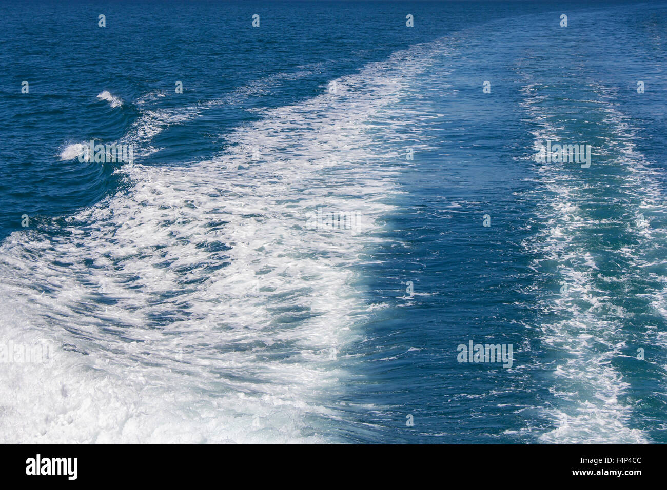 Trace of sea water made by cruise ship Stock Photo - Alamy
