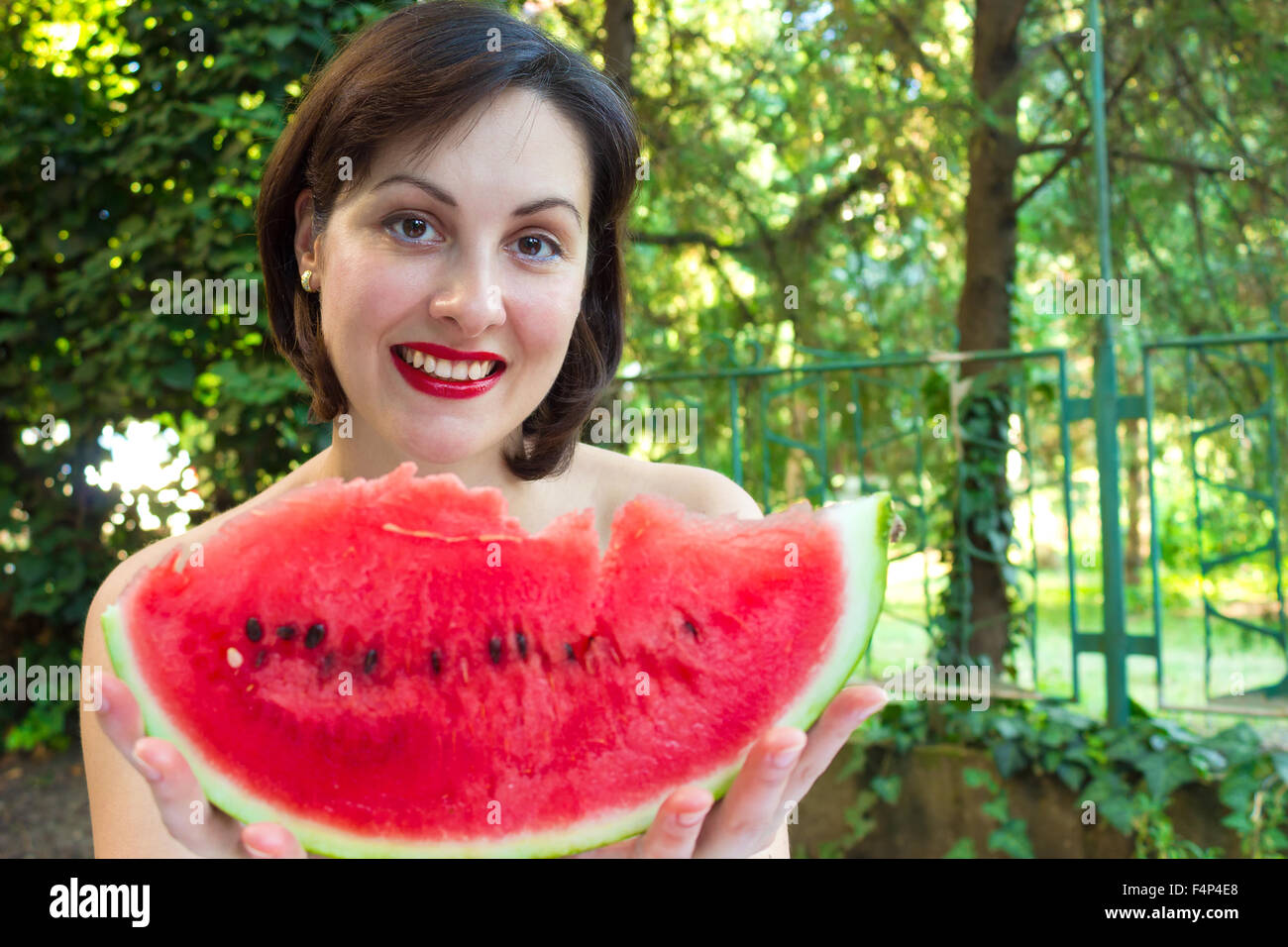 Woman with watermelon Stock Photo - Alamy