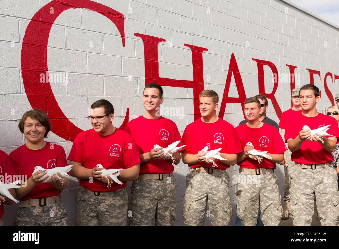 Citadel Military college cadets hold doves before the releasing them to ...