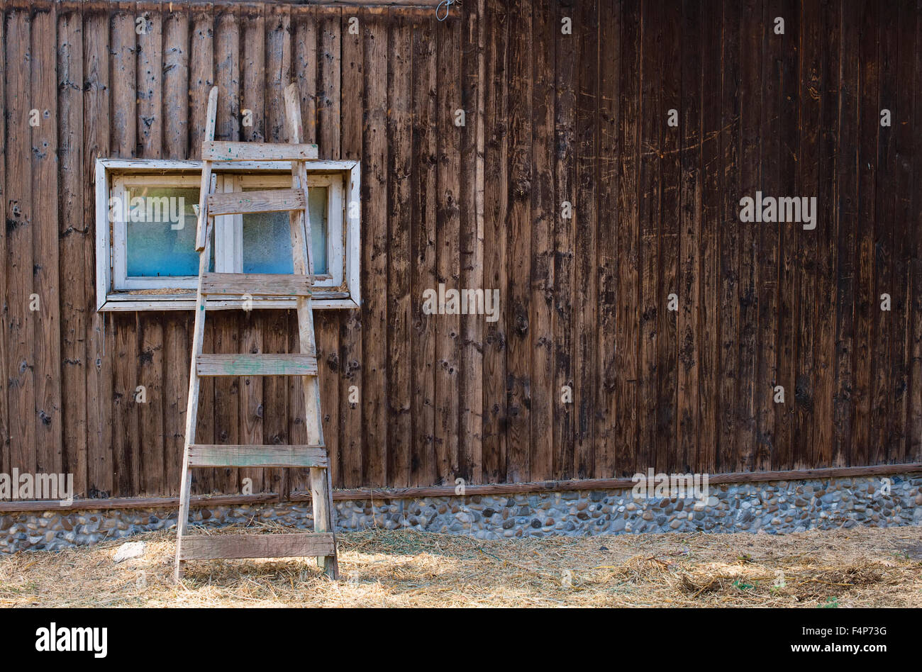 Ladder against wooden house hi-res stock photography and images - Alamy