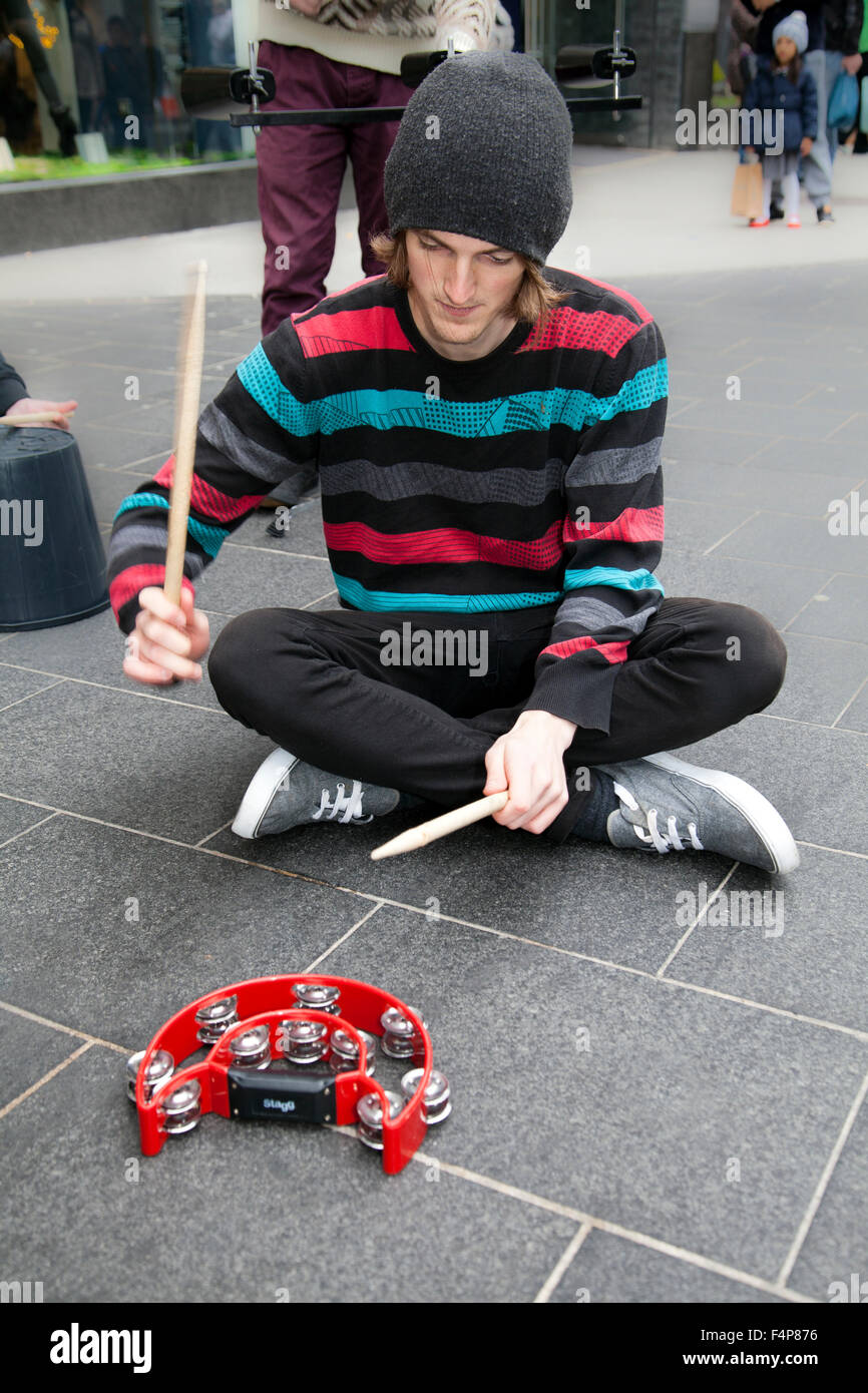 A group of buskers on the main streets of Liverpool one shopping parade ...