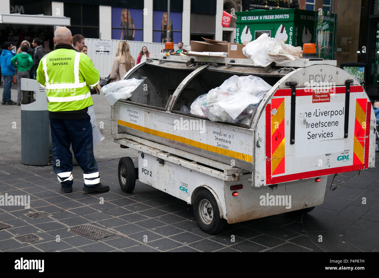 A streetscene liverpool refuse collector, Liverpool One shopping parade ...