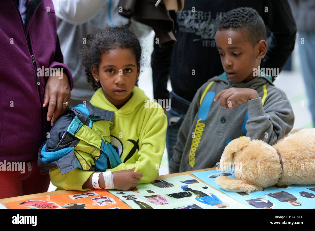 Refugees get clothes in a refugee emergency accommodation, Germany ...