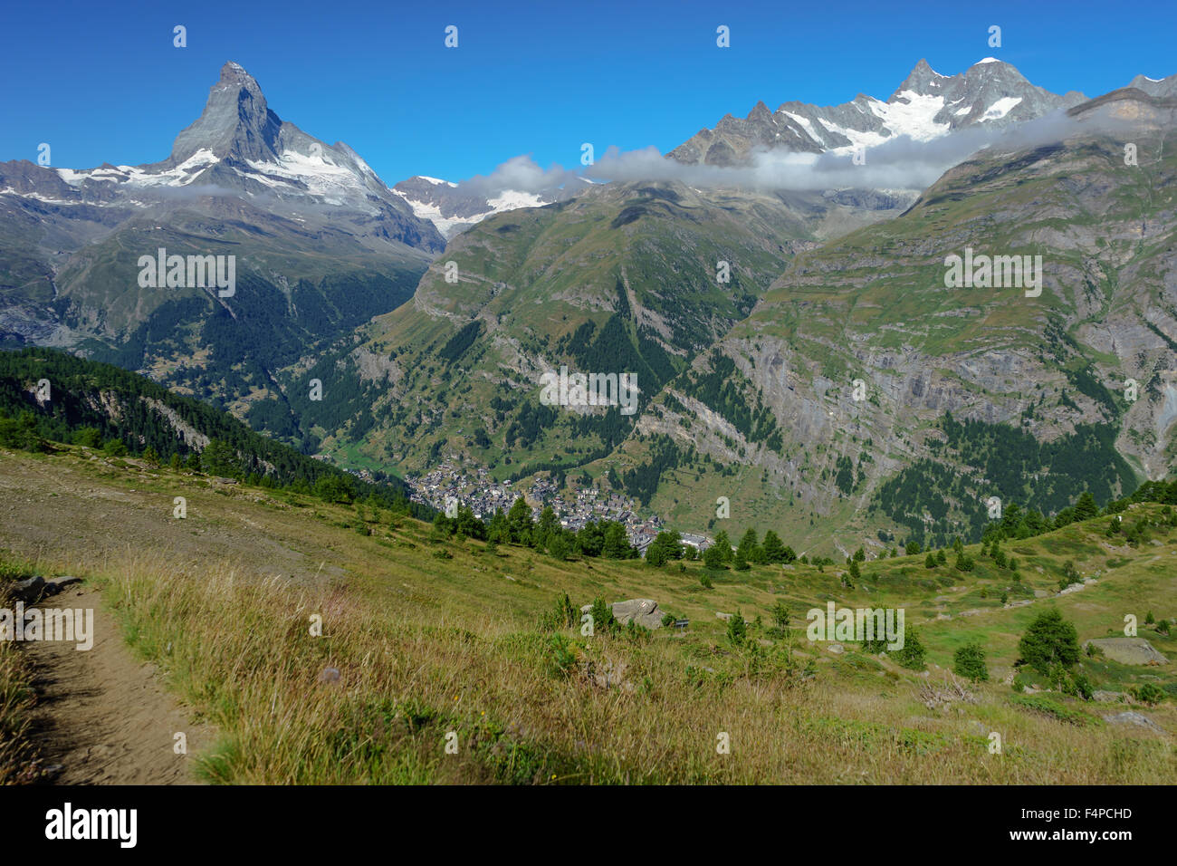 A trail and mountain range at Matterhorn in the Swiss Alps. July, 2015 ...