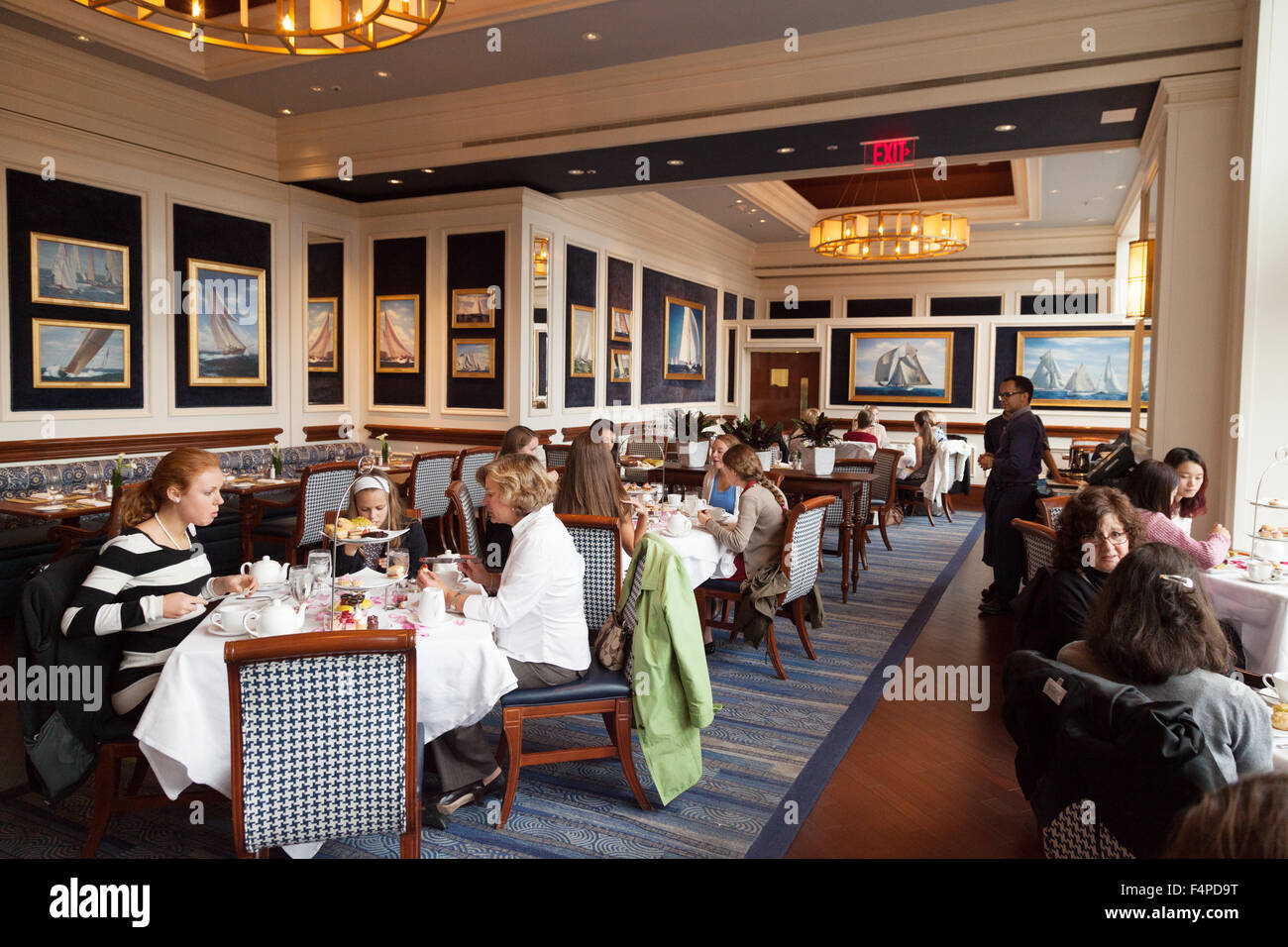Hotel guests enjoying afternoon tea; the luxury Boston Harbor Hotel ...