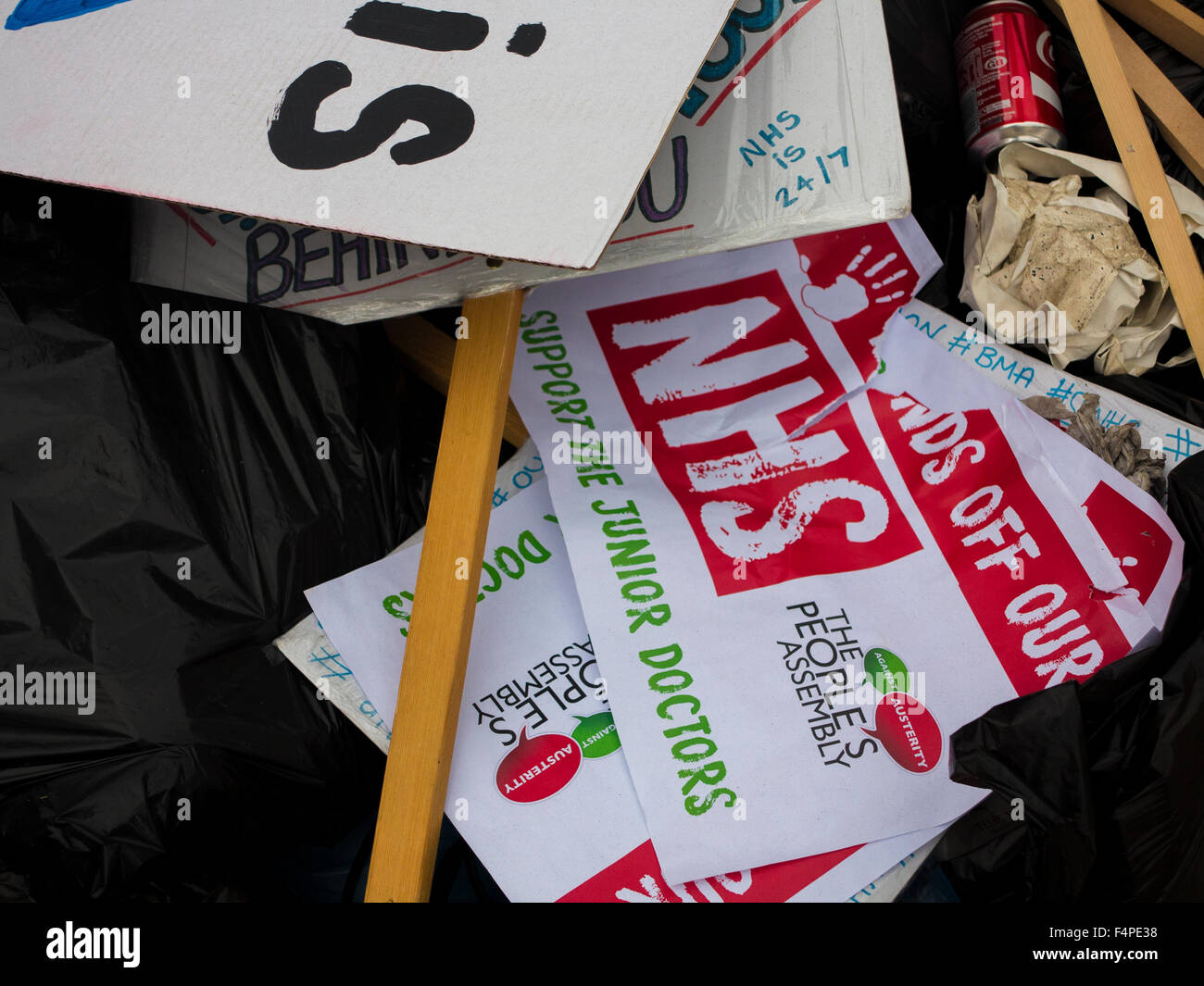 Leftover placards and signs from a protest about the NHS in London ...