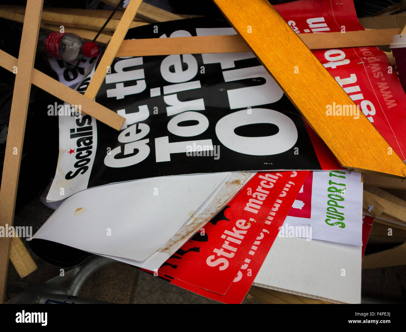 Leftover placards and signs from a protest about the NHS in London ...