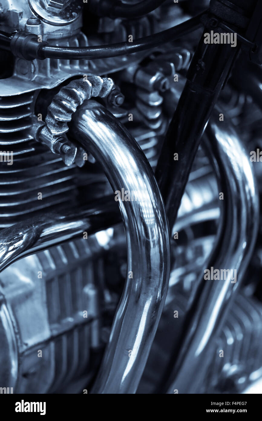 Detail of a motorcycle exhaust pipes and cylinders Stock Photo - Alamy