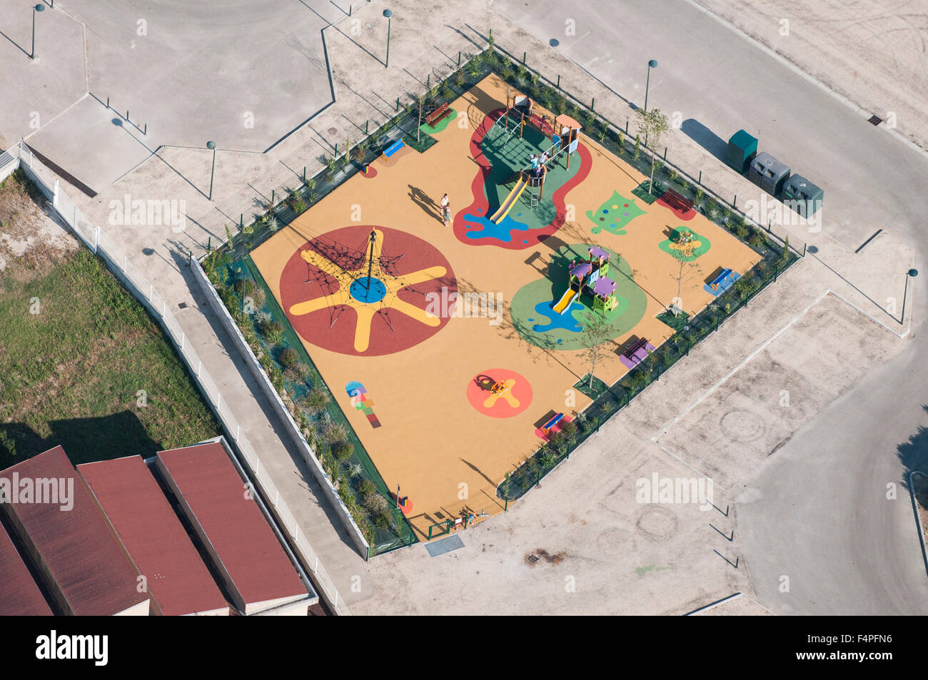 Aerial image of a colourful playground with kids Stock Photo - Alamy