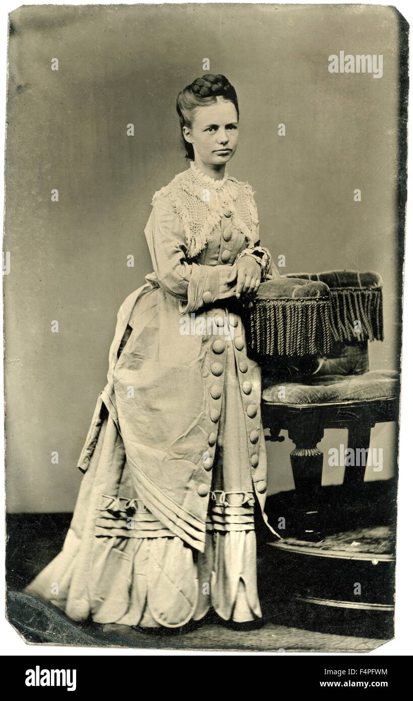 Portrait of Standing Adult Woman in Long Dress with Large Buttons ...