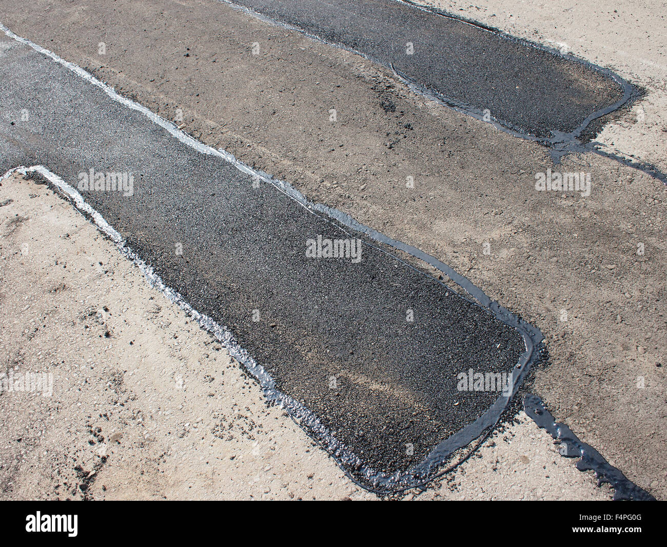 Repair pavement and laying new asphalt patching method outdoors Stock ...