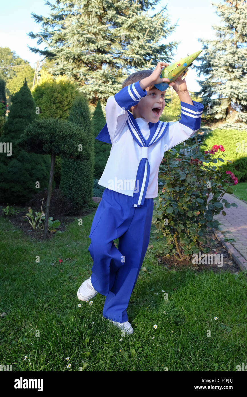Child boycelebrating after fabulous ceremony in which he was nominated ...