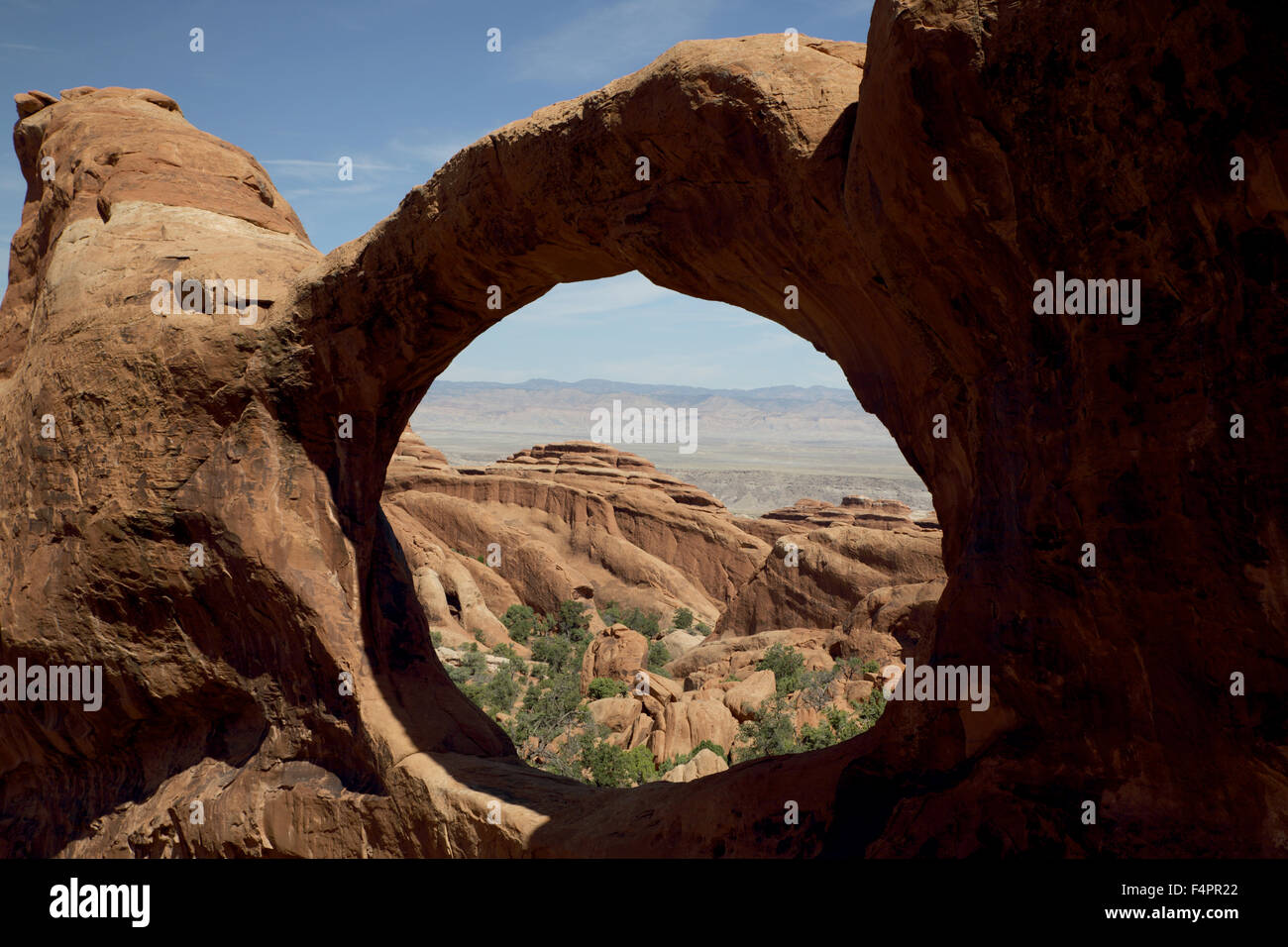 Landscape through double arch arches national park hi-res stock ...
