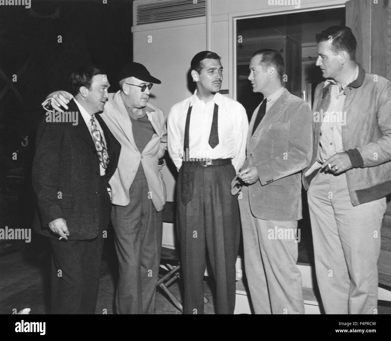 On the set, John Ford with Thomas Mitchell, Clark Gable, Robert ...