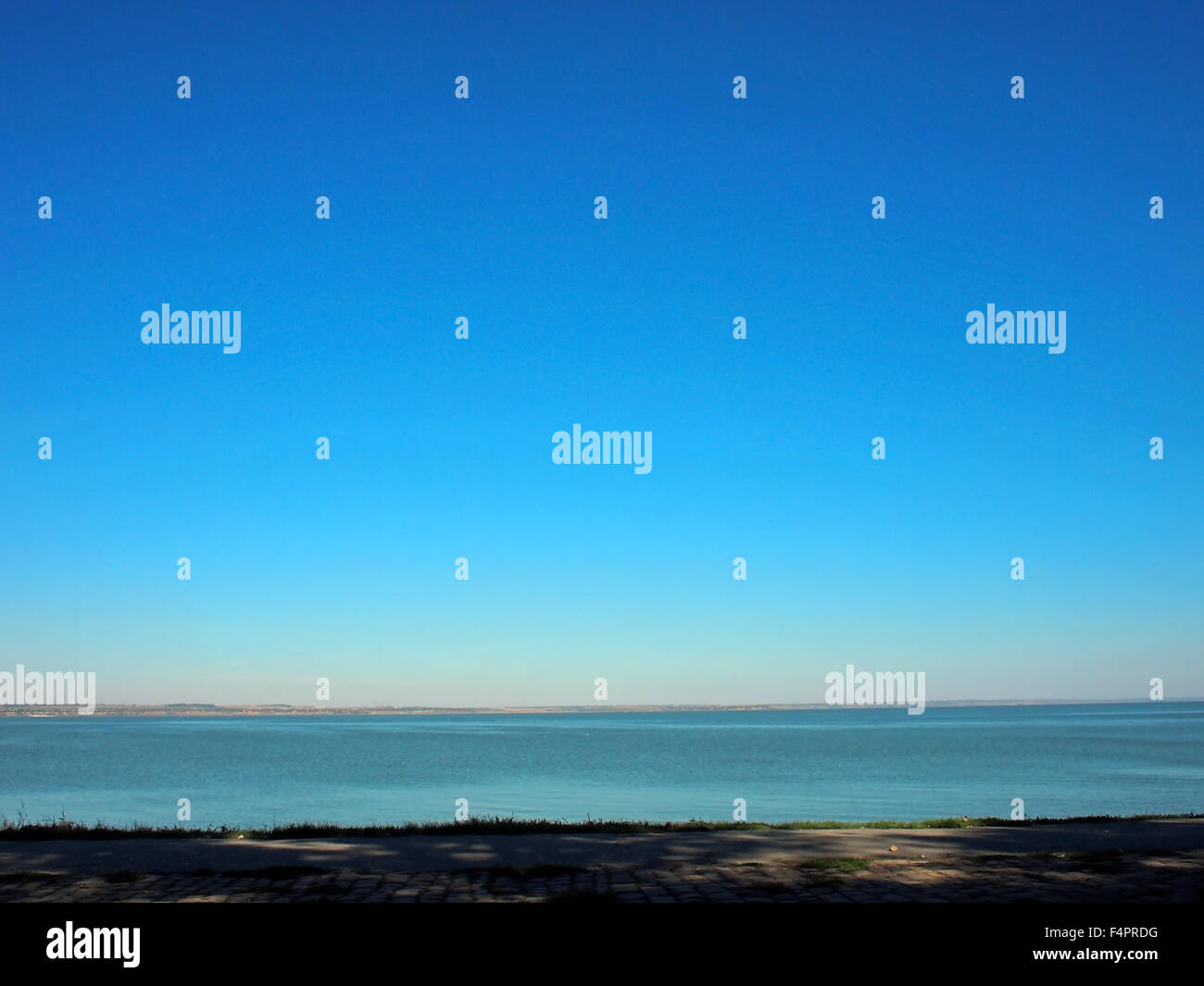 Horizon over water with blue sea and blue sky hi-res stock photography ...