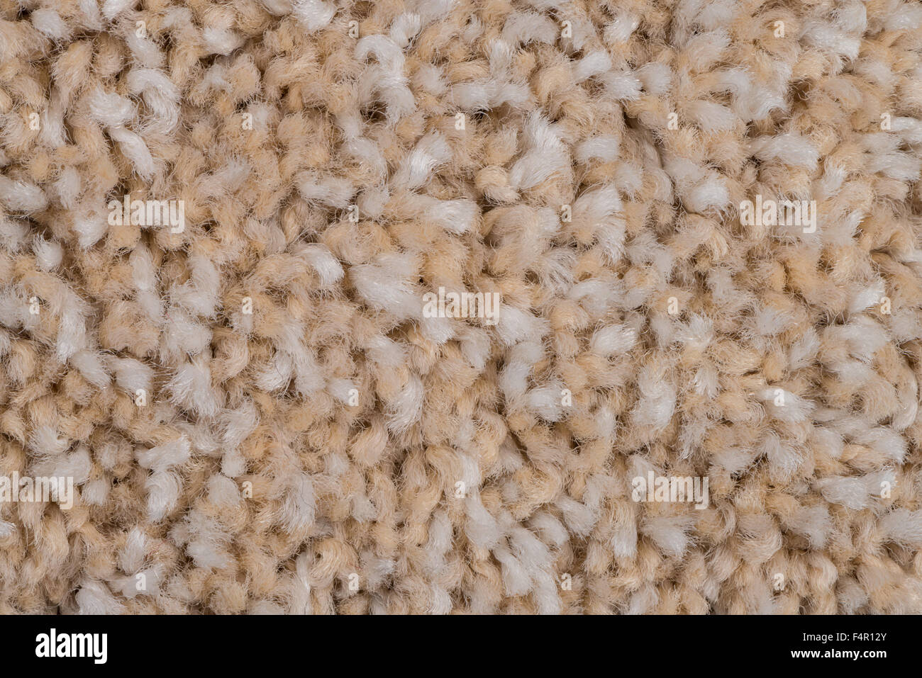 Closeup detail of beige carpet texture background Stock Photo - Alamy