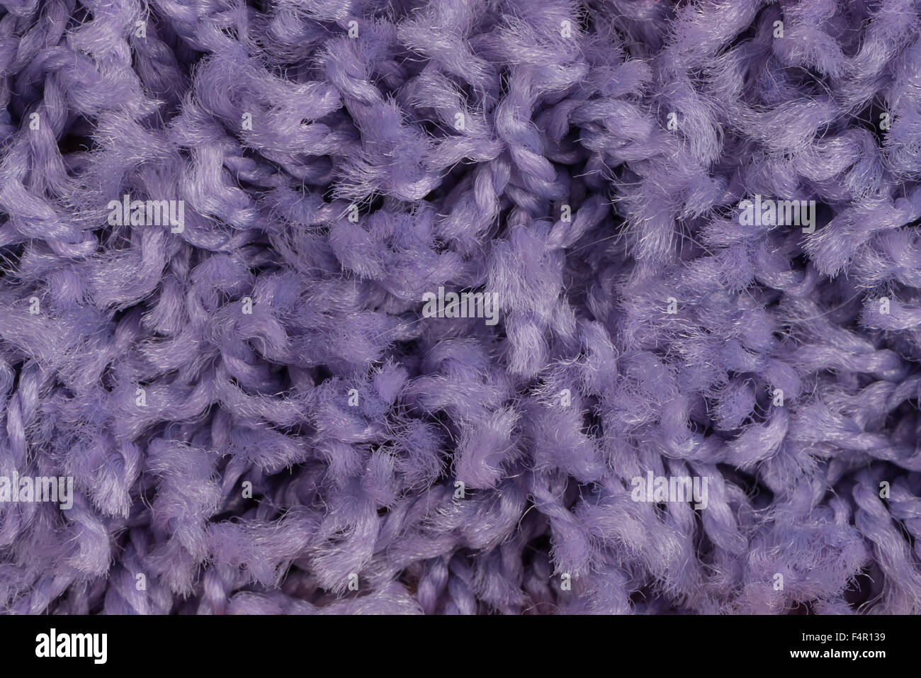 Closeup detail of purple carpet texture background Stock Photo - Alamy