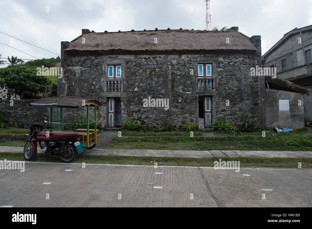 Batanes, Philippines, March 28,2015: A colonial style an Ivatan ethnic ...