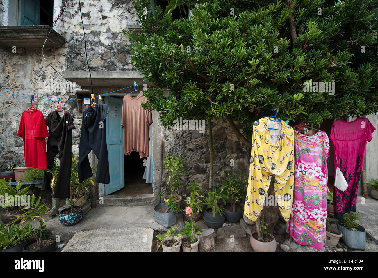 Batanes, Philippines, March 28,2015: A colonial style an Ivatan ethnic ...