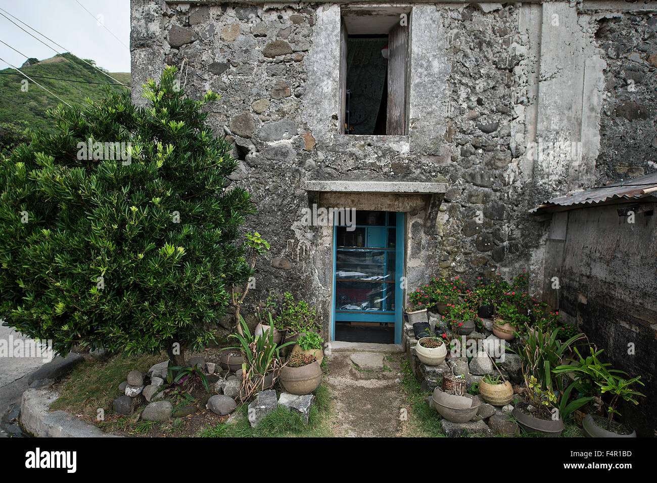 Batanes, Philippines, March 28,2015: A colonial style an Ivatan ethnic ...