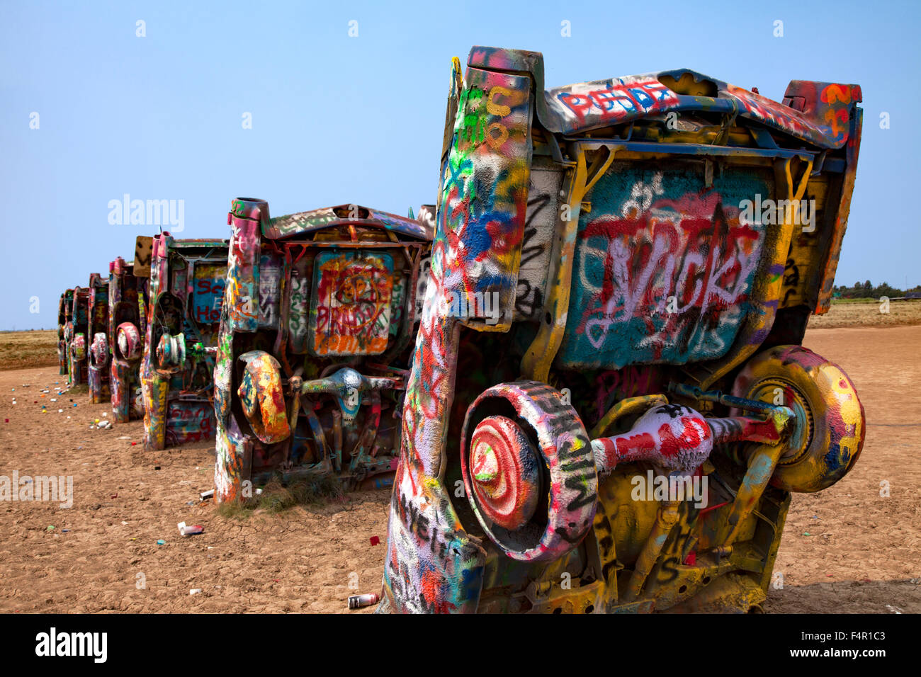 Graffiti covered Cadillacs at Cadillac Ranch along Route 66 in Texas ...
