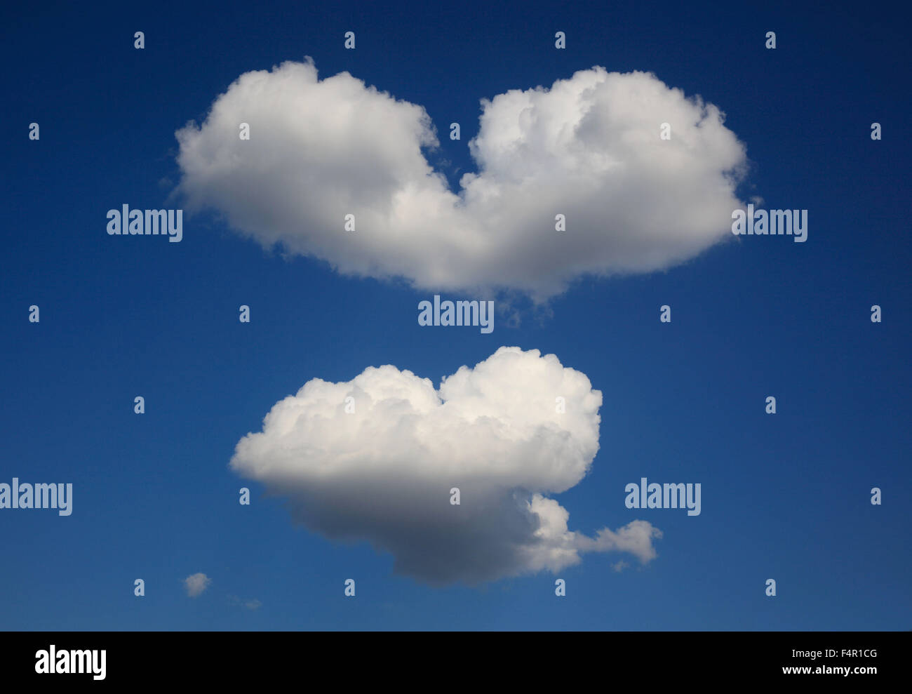 Heart-shaped clouds in the sky Stock Photo - Alamy