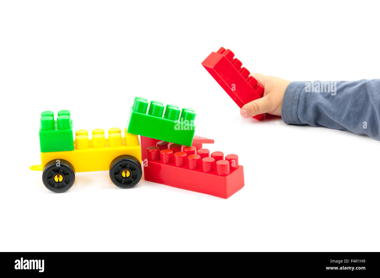 Hand stack up lego set hi-res stock photography and images - Alamy