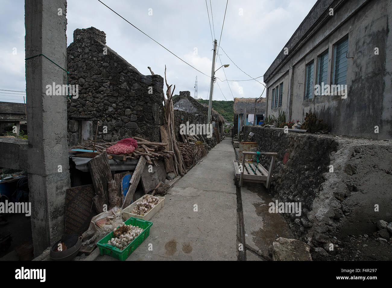 Batanes, Philippines, March 27,2015: A colonial style an Ivatan ethnic ...