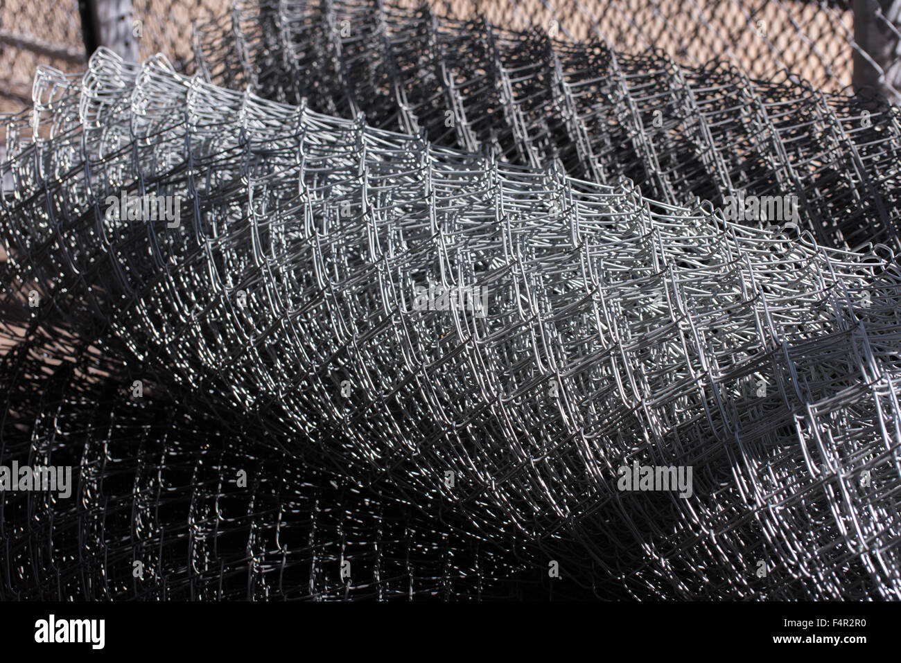 outdoor building materials - rolls of chain link fence Stock Photo - Alamy