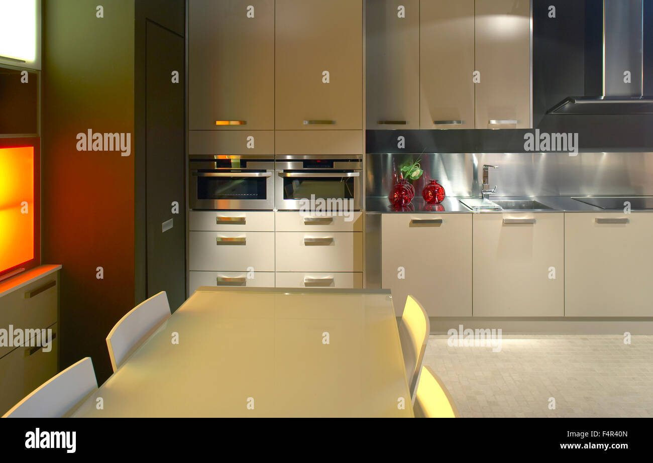 View of a domestic modern kitchen with cabinets, drawers, ceramic ...